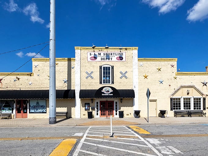 The SAM Shortline Depot isn't playing dress-up for tourists—this is the genuine article, a working historic railroad that connects small towns across Georgia.