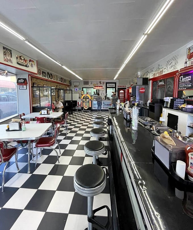 Step inside and time politely pauses. The black and white checkered floor and chrome stools aren't retro by design—they're authentic survivors from a simpler era.
