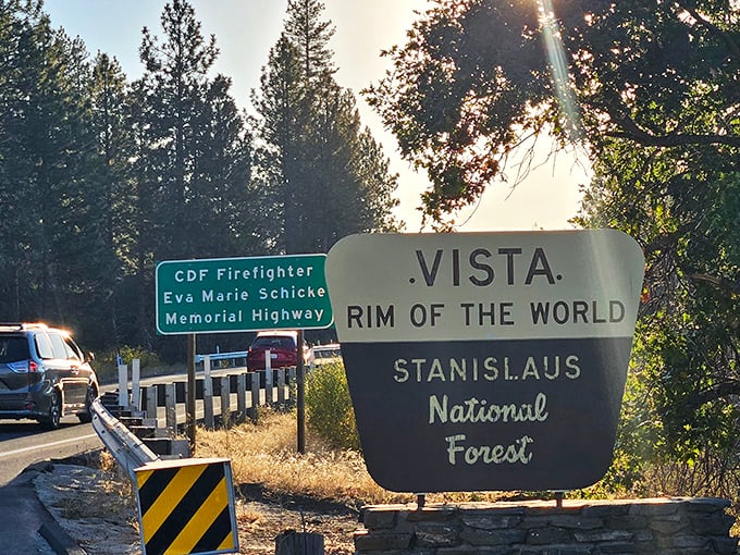 The sign says it all – you've reached the edge of something magical. Time to breathe that pine-scented air.