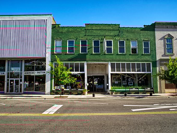 This emerald-hued storefront could be straight out of a Wes Anderson film – quirky, colorful, and promising something delightfully unexpected inside.