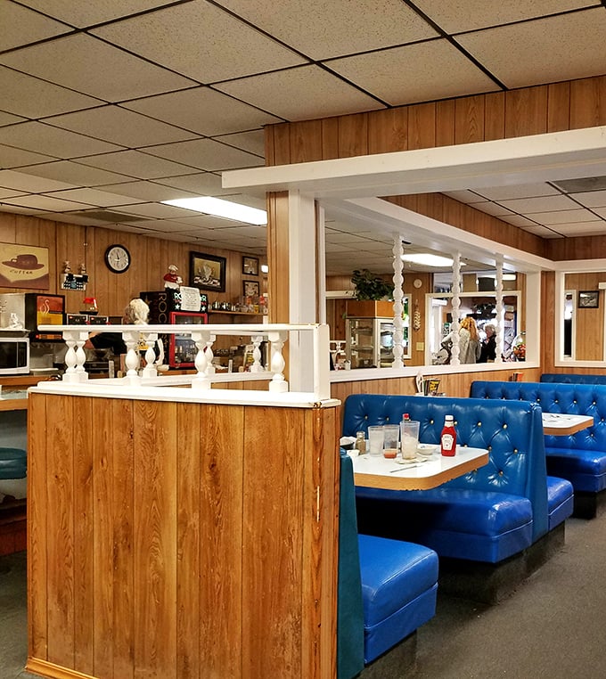 Those blue vinyl booths aren't just seating – they're front-row tickets to the greatest show on earth: breakfast served without pretension or apology.
