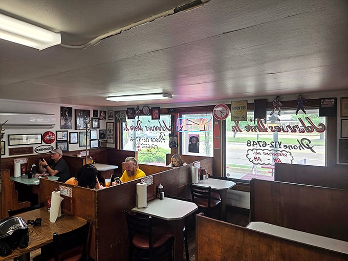 The interior feels like stepping into a time capsule—wooden booths worn smooth by decades of satisfied customers sharing stories over comfort food classics.