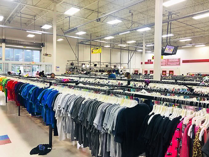 A rainbow of possibilities stretches as far as the eye can see. Like a textile library where every garment has a story waiting to be continued.