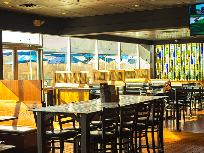 Sunlight streams through windows, casting a golden glow across wooden tables. This isn't just dining—it's dinner theater with comfort as the star.