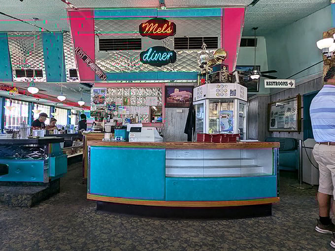 Step inside and time travel begins – turquoise and pink neon welcomes you to a world where calories don't count and coffee refills are infinite.
