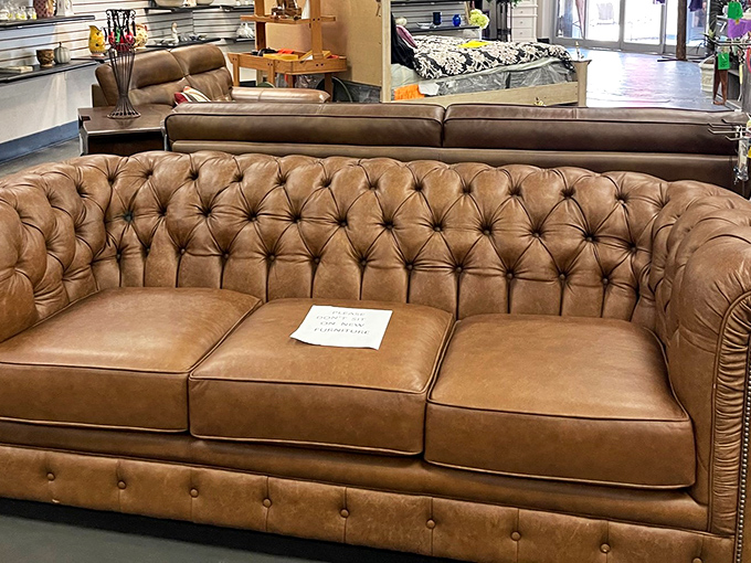 This tufted leather Chesterfield isn't just a sofa—it's someone's future family heirloom waiting to be discovered at a fraction of retail price.