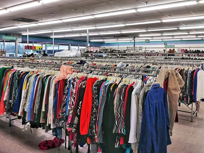 A sea of possibilities hanging on racks as far as the eye can see. Each garment has a story—and your next favorite outfit is hiding somewhere in this textile jungle.
