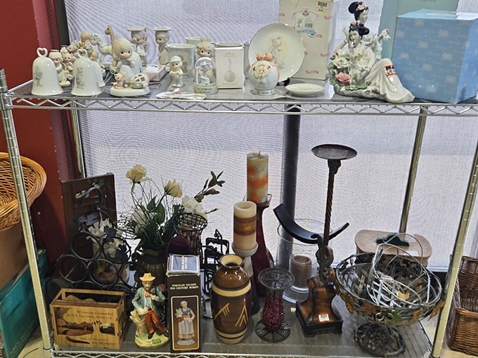 Precious Moments figurines and vintage treasures await new homes, like supporting actors ready for their second act on someone's mantel.