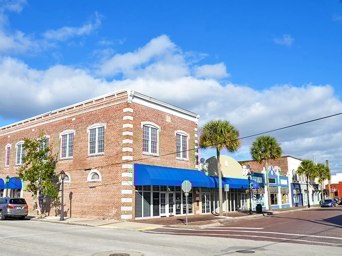 The historic brick buildings with their bright blue awnings create a downtown that feels like a movie set – minus the Hollywood price tag.