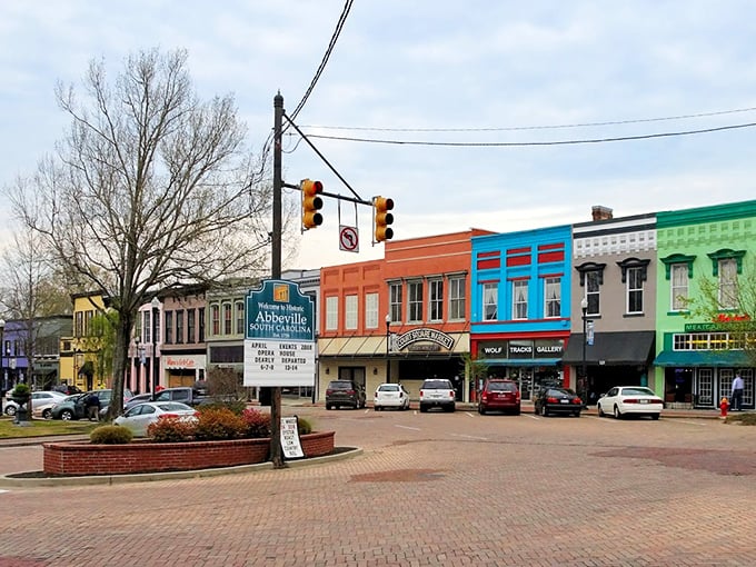 Downtown Abbeville proves that rainbow architecture and small-town charm make perfect dance partners on this brick-paved stage.