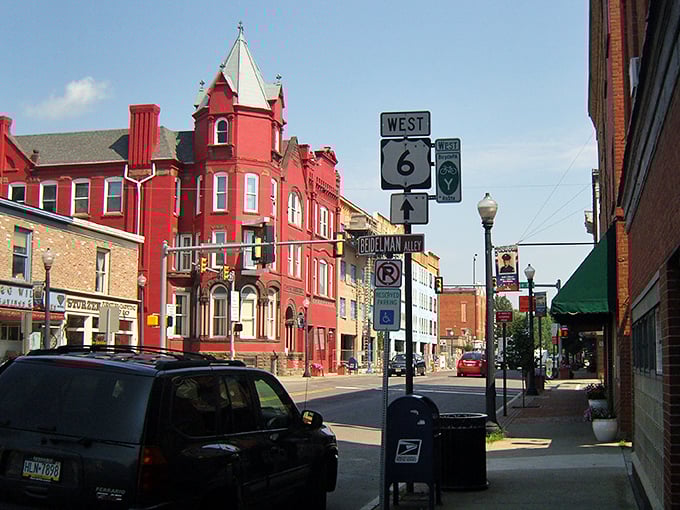 That striking red Victorian building commands attention like a cardinal in winter – Towanda's architectural showstopper.