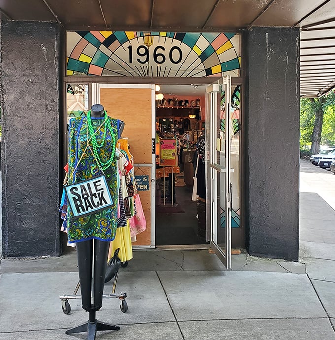 That sidewalk sale rack isn't just clothes—it's the appetizer before the main course of vintage delights waiting inside those doors.