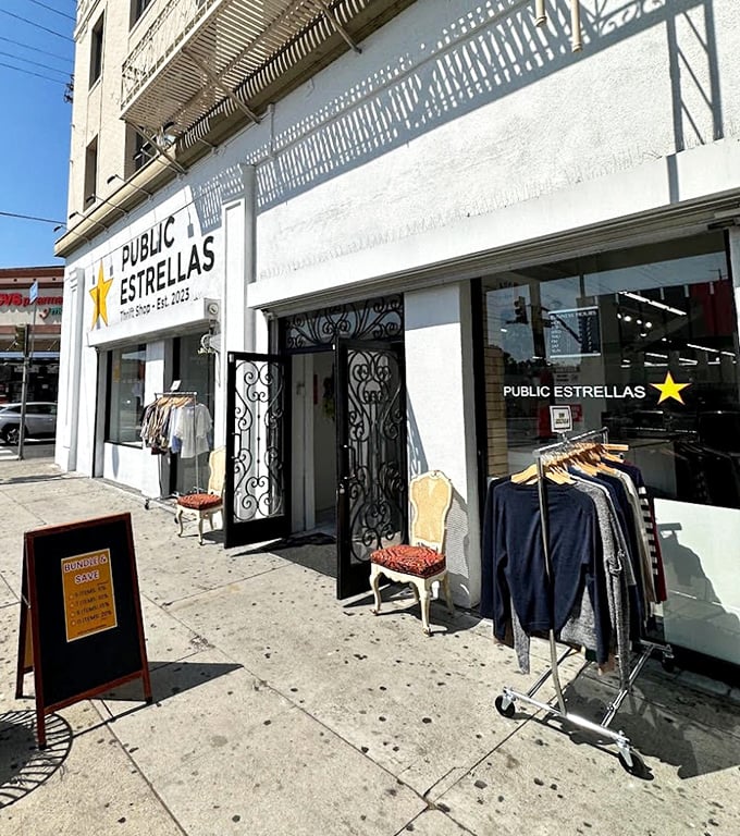 The entrance beckons with ornate iron doors and sidewalk racks—a siren call to bargain hunters and vintage enthusiasts alike.