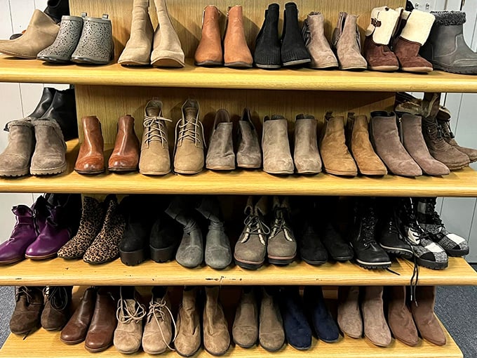 A battalion of boots stands at attention, each pair with its own story and miles already traveled.