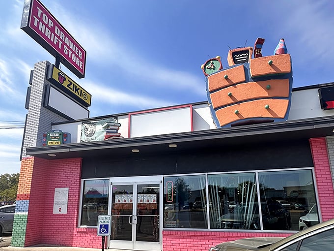 Like a colorful patchwork quilt of brick and creativity, Top Drawer's facade welcomes bargain hunters with its distinctive dresser-themed sign.
