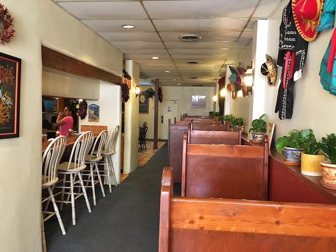 Wooden booths worn smooth by decades of happy diners create that perfect "everybody knows your name" atmosphere. Comfort begins before the food arrives.