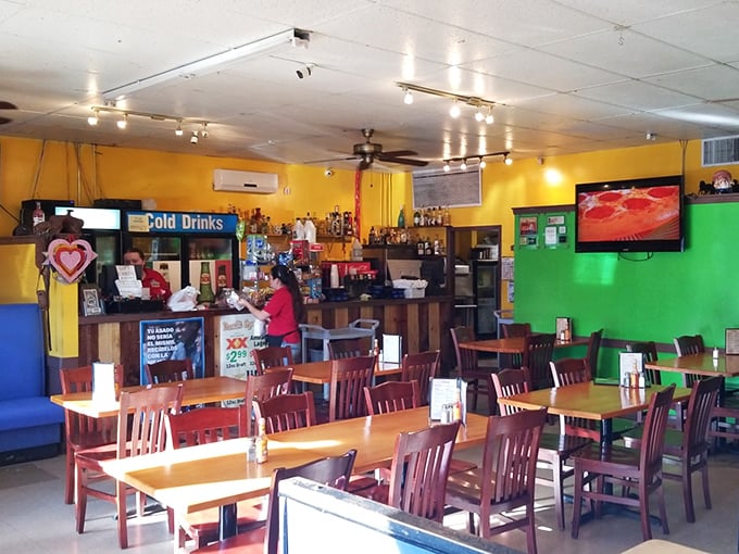 Vibrant yellow and green walls create the perfect backdrop for culinary adventures—like stepping into a Mexican home where the food, not the decor, is the star.
