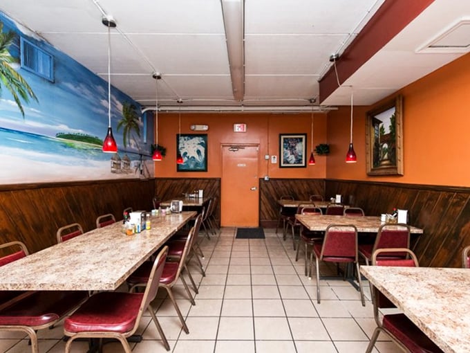 Inside, the warm terracotta walls and wooden wainscoting create that perfect "abuela's dining room" vibe – unpretentious comfort that lets the food be the star.