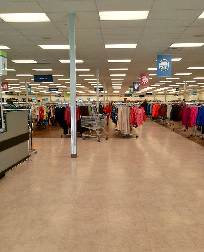 The women's clothing section—organized by color and type—creates a rainbow road of possibilities for fashion-forward bargain hunters.