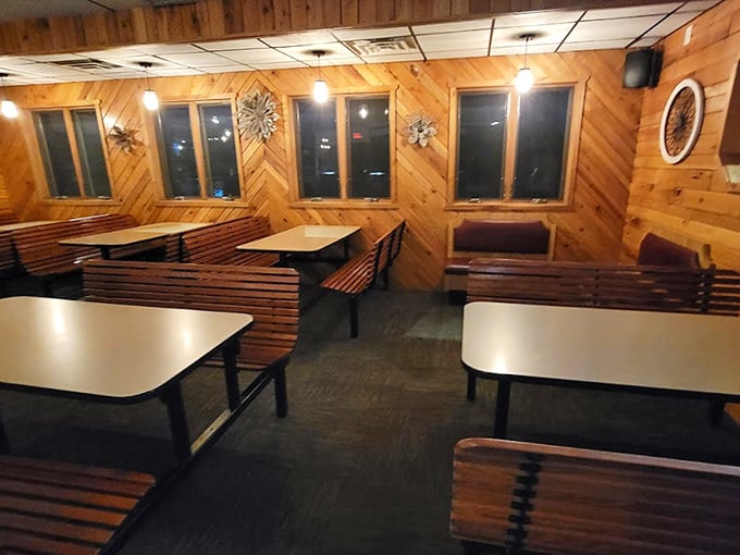Wood-paneled walls and classic booth seating create that unmistakable supper club ambiance—like stepping into a time machine set to "peak comfort."