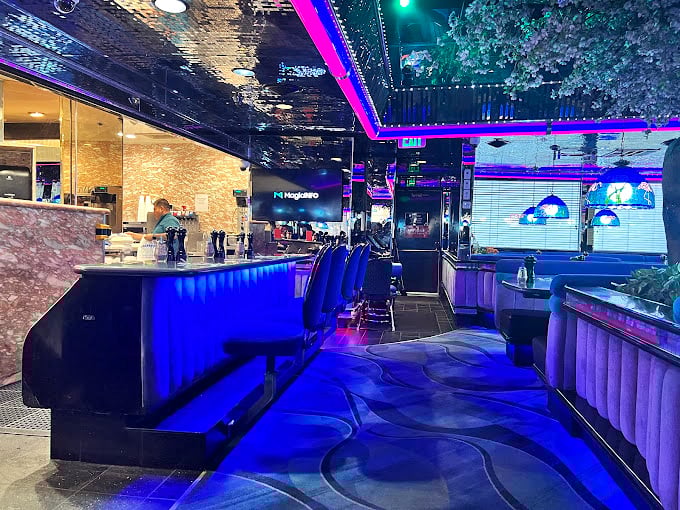 Step into the Fireside Lounge and you've entered a time capsule of Vegas cool – all mirrors, neon, and plush seating that whispers, "What happens here stays here."