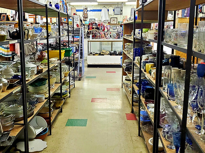 Glassware alley stretches toward infinity, where your grandmother's china pattern and that perfect missing juice glass are waiting to be rediscovered.