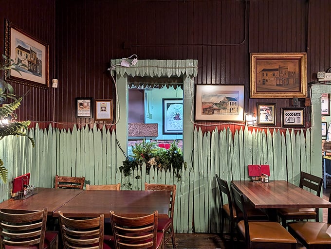 The charming interior features mint-green picket fence dividers that wouldn't be out of place in your grandmother's favorite restaurant circa 1965—comfort before it was cool.