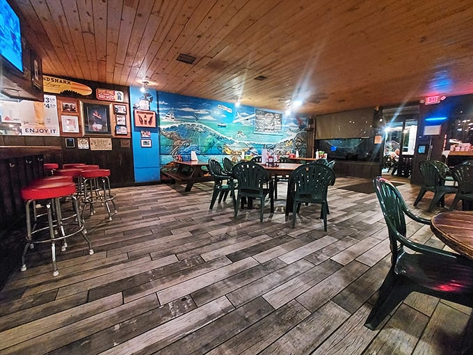 Wooden ceiling, weathered floors, and those classic green chairs – it's like dining in the cabin of a beloved old fishing boat that happens to serve incredible food.