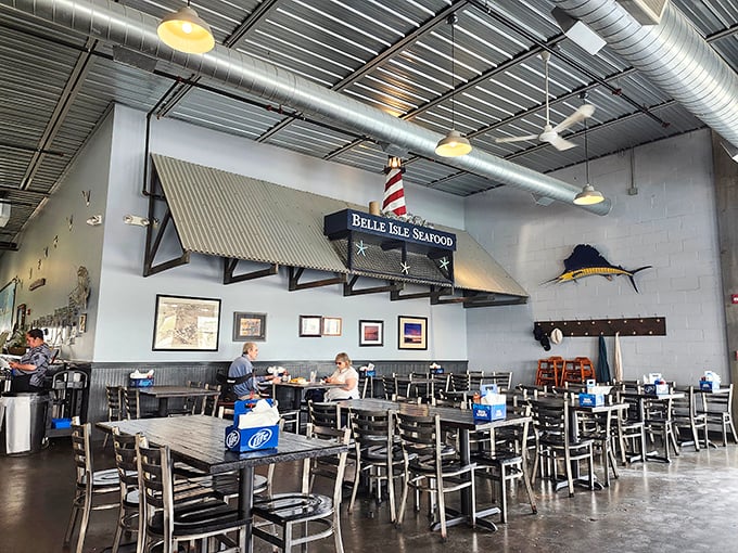 Industrial meets nautical in this spacious dining area where the only thing more satisfying than the atmosphere is what's on your plate.