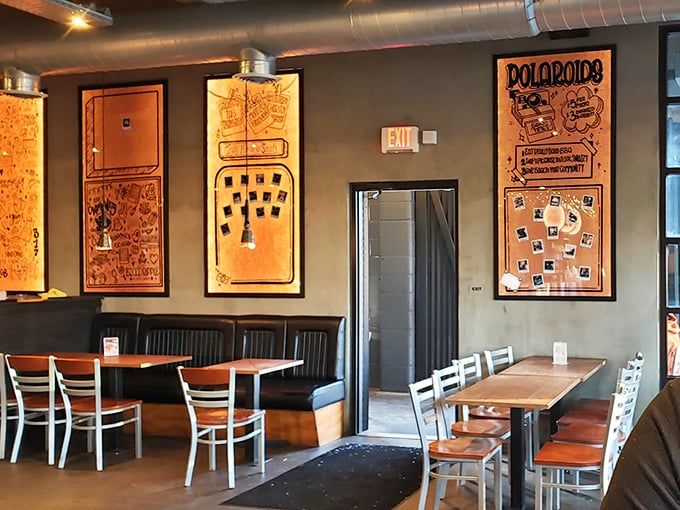 Industrial chic meets barbecue comfort – the Polaroid wall tells stories of satisfied customers who couldn't resist documenting their meat-induced happiness.
