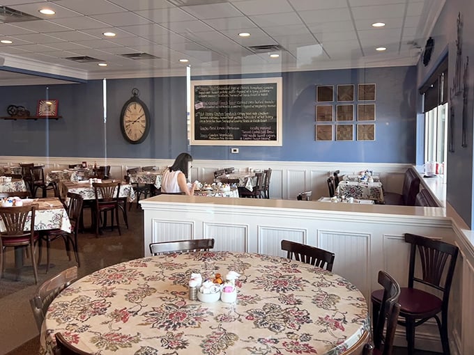 Blue walls, wooden wainscoting, and floral tablecloths create the perfect trifecta of comfort—like breakfast at your favorite aunt's house, if your aunt were a culinary genius.