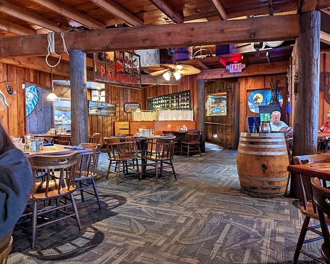 Exposed beams, wooden barrels, and nautical touches transform this Albuquerque dining room into a New England fishing lodge that forgot it's 700 miles from the ocean.