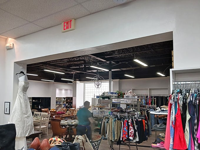 Step inside and the treasure hunt begins—wedding dresses and casual wear coexist in this organized chaos of fashion possibilities.