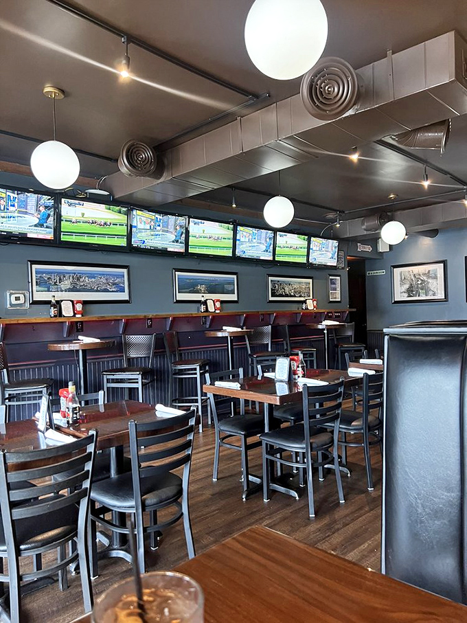 Blue walls, wooden tables, and multiple screens showing Boston sports – it's like they airlifted a corner of Fenway Park to Tennessee.