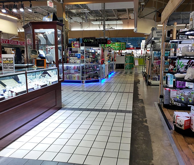 Gleaming display cases and tiled walkways create a mall-like atmosphere, minus the corporate uniformity. Each booth tells its own story through carefully arranged merchandise.