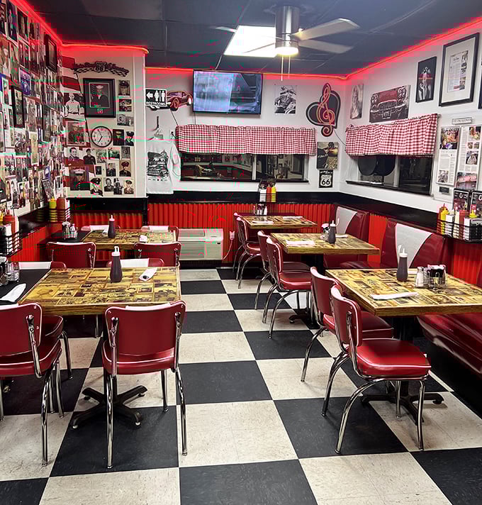 The quintessential American diner experience: checkered floors, red vinyl booths, and walls plastered with memories – calories and nostalgia served in equal measure.