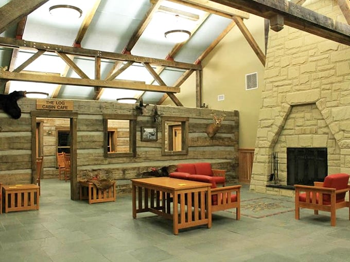 Inside, the marriage of log cabin walls and soaring ceilings creates a space that whispers "wilderness luxury" without a hint of pretension.