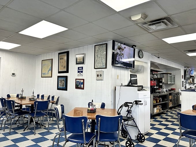 Step inside and you're greeted by that classic diner charm—blue and white checkerboard floors, simple tables, and walls that tell stories of Mississippi's past.