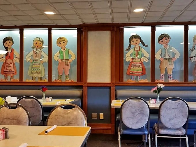 Folk art figures watch over diners like cheerful ancestors, silently approving your decision to order the legendary chicken dinner.