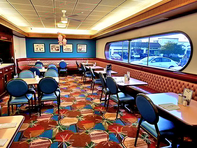 Step into a time machine where the carpet explodes with atomic-age patterns and the booths invite you to slide in for a while.