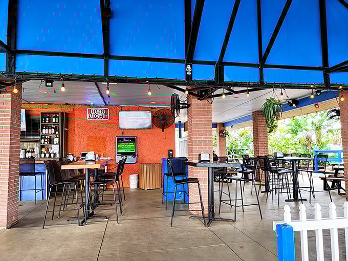 The interior strikes that perfect balance between "I'm on vacation" and "I could become a regular here." String lights and open-air seating seal the deal.