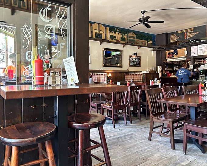 Wooden chairs, worn floors, and decades of character – Zip's interior feels like stepping into a time machine where burgers have always been king.