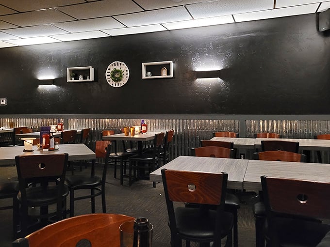 Dark walls, warm wood tones, and just-right lighting create that perfect Wisconsin supper club ambiance – not too fancy, not too casual, just right.