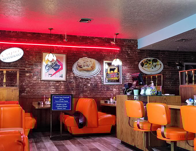 Step into a time machine disguised as a diner. Those orange vinyl booths have cradled more Boise bottoms than any furniture deserves.