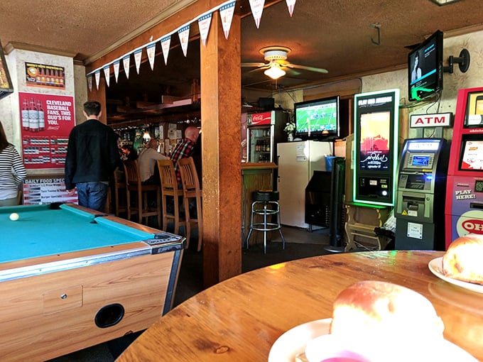 Inside, the classic tavern vibe hits all the right notes—pool table, sports on TV, and that unmistakable buzz of locals who know they've got a good thing going.
