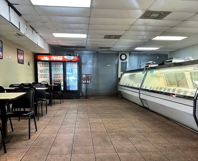No-frills interior where culinary magic happens. The seafood counter and simple seating tell you they're focused on what matters—the food, not the feng shui.