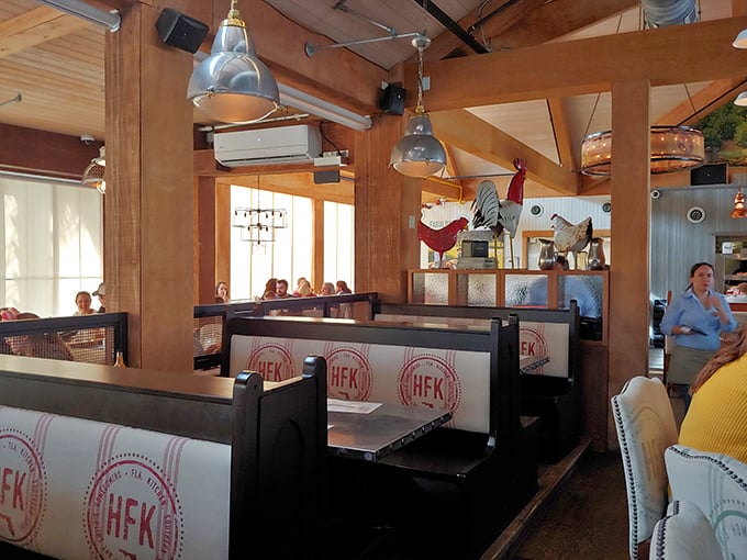 The "HFK" branded booths aren't just seating—they're front-row tickets to a Southern food revival that'll have you plotting your next visit before dessert.