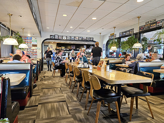 Inside Eddie's, the bustling dining room hums with conversation and clinking plates – the universal soundtrack of a beloved local institution.