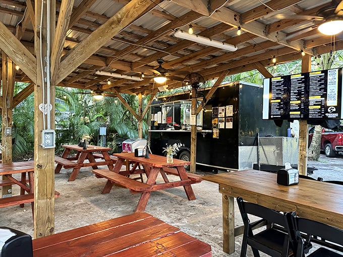 Rustic wooden beams, picnic tables, and string lights create the world's most inviting treehouse for grown-ups who love great food.