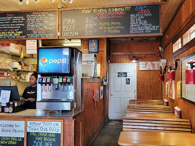 Where barbecue dreams come true! The handwritten chalkboard menu and wooden interior tell you this place prioritizes smoke rings over fancy rings.